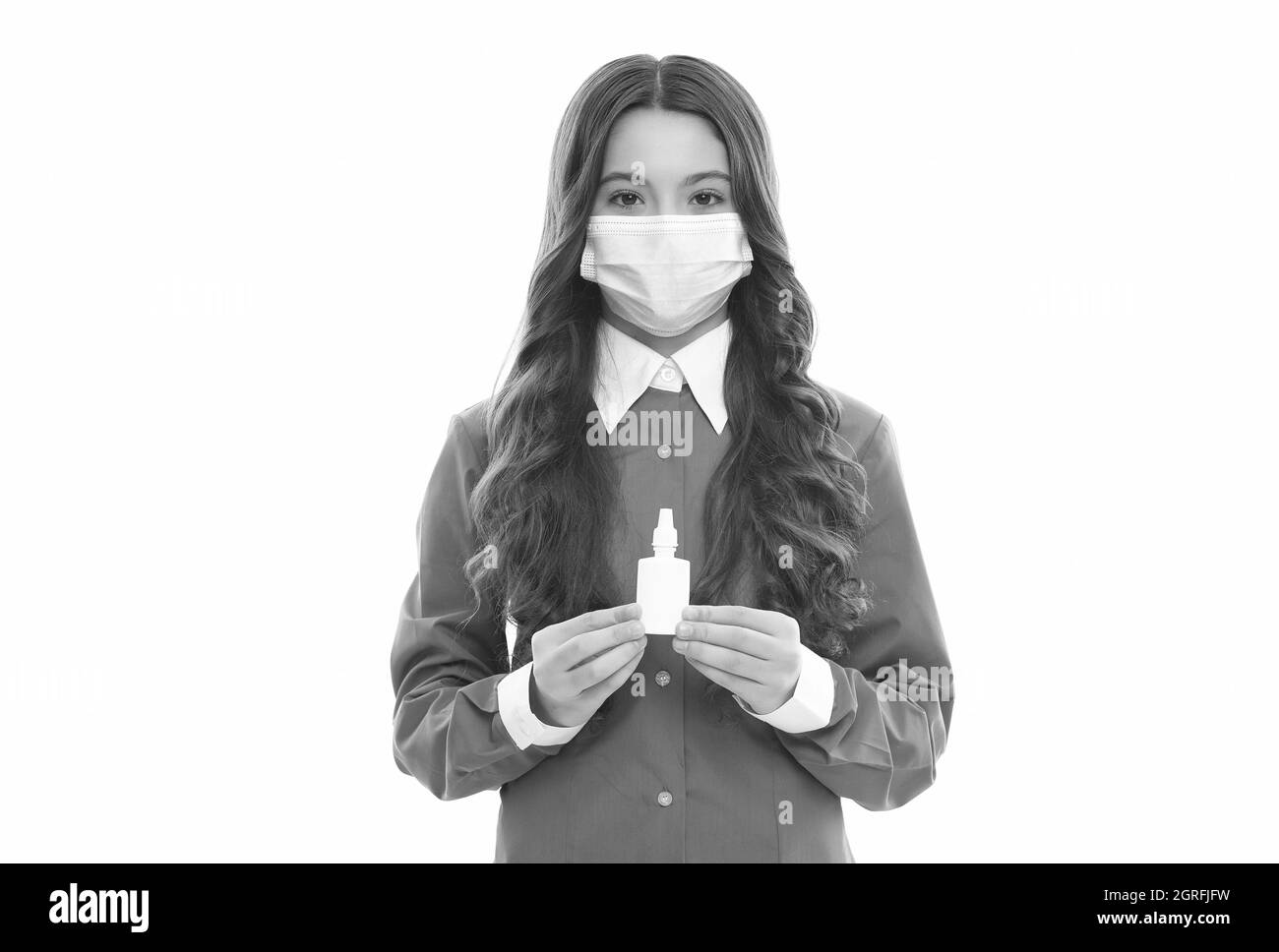 girl in mask hold nasal drops. child presenting nasal spray. runny nose ...