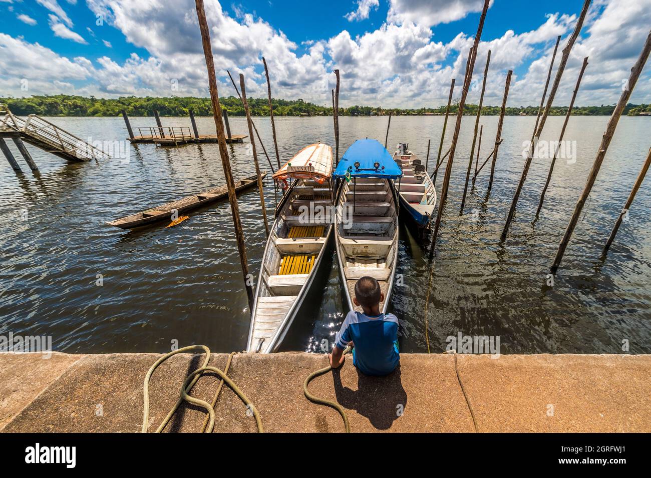Boy river boat hi-res stock photography and images - Alamy
