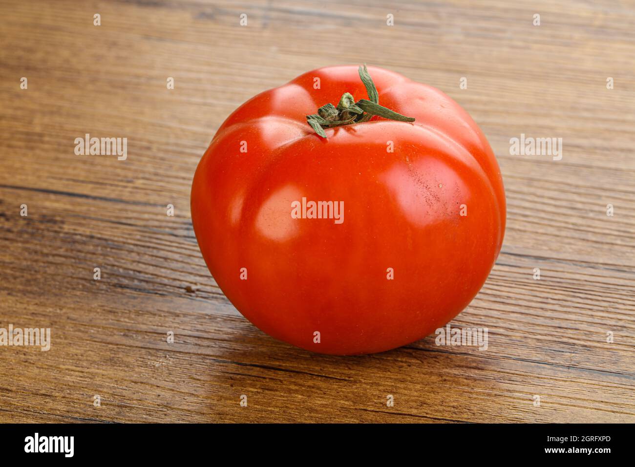 Red ripe big juicy tomato isolated Stock Photo - Alamy