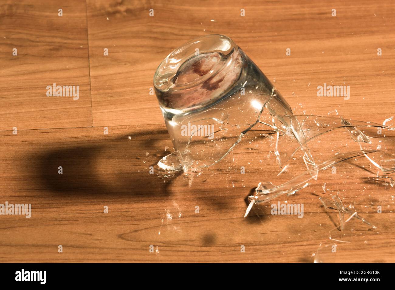 Broken drinking glass on the floor hi-res stock photography and images ...