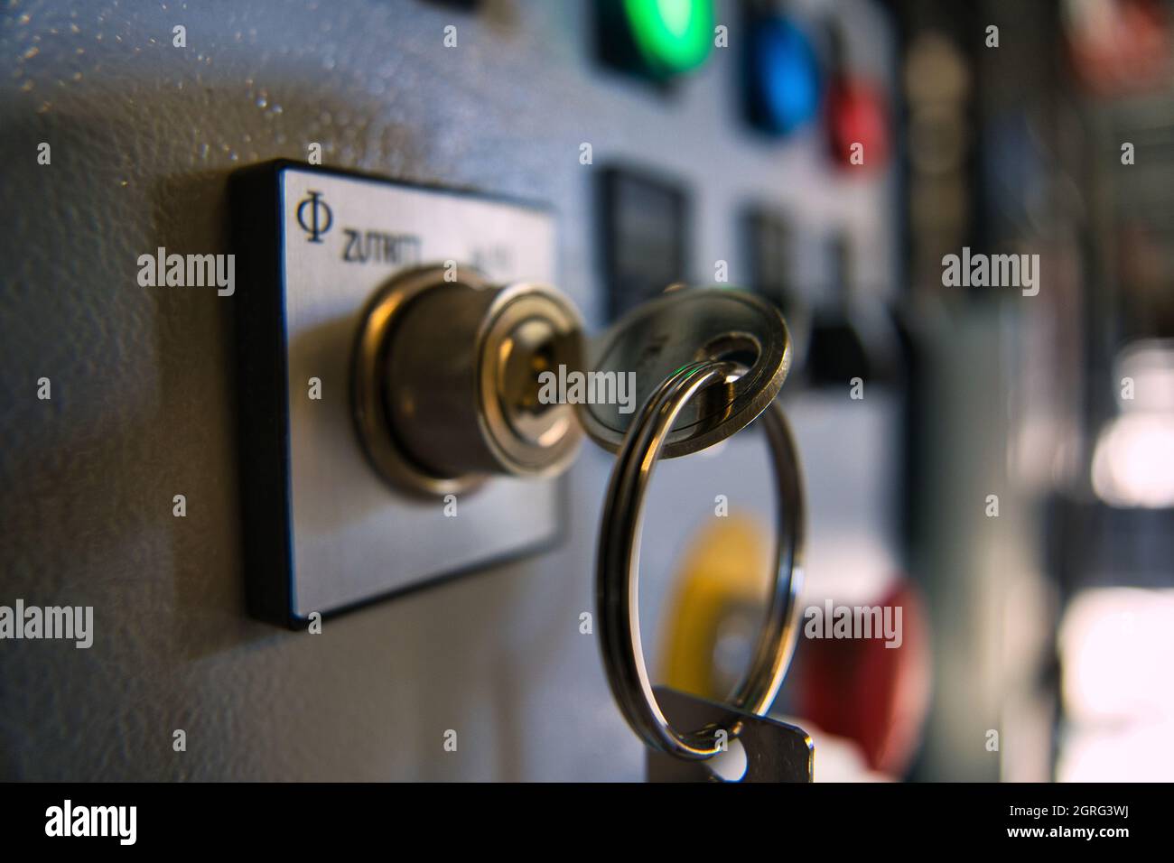 Shallow focus of a key on blurred background of buttons on an ...