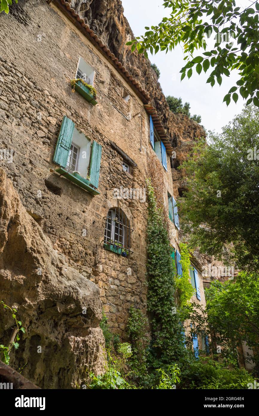 France, Var, Green Provence, Cotignac, troglodyte habitat in the tuff ...