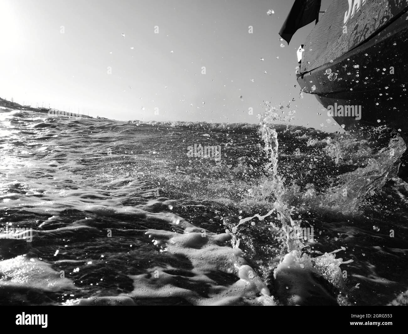 Wave hitting boat hi-res stock photography and images - Alamy