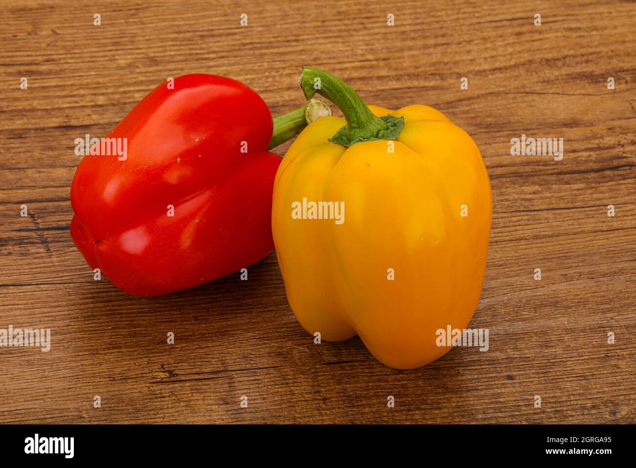 Two Ripe sweet Bulgarian bell peppers Stock Photo - Alamy