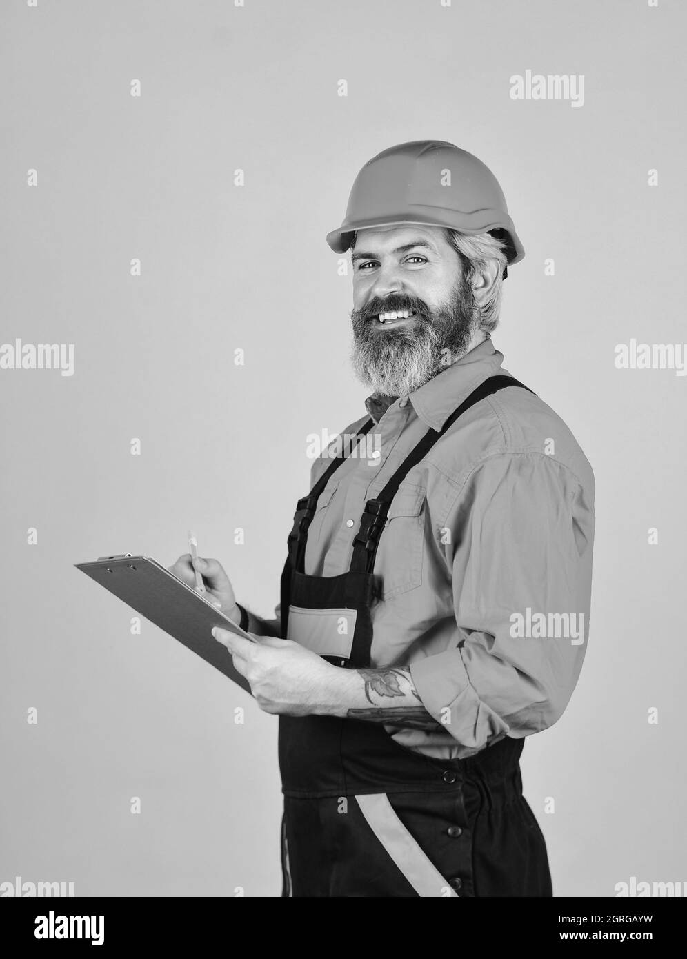 Checklist. Inspecting. Control concept. Foreman with document ...