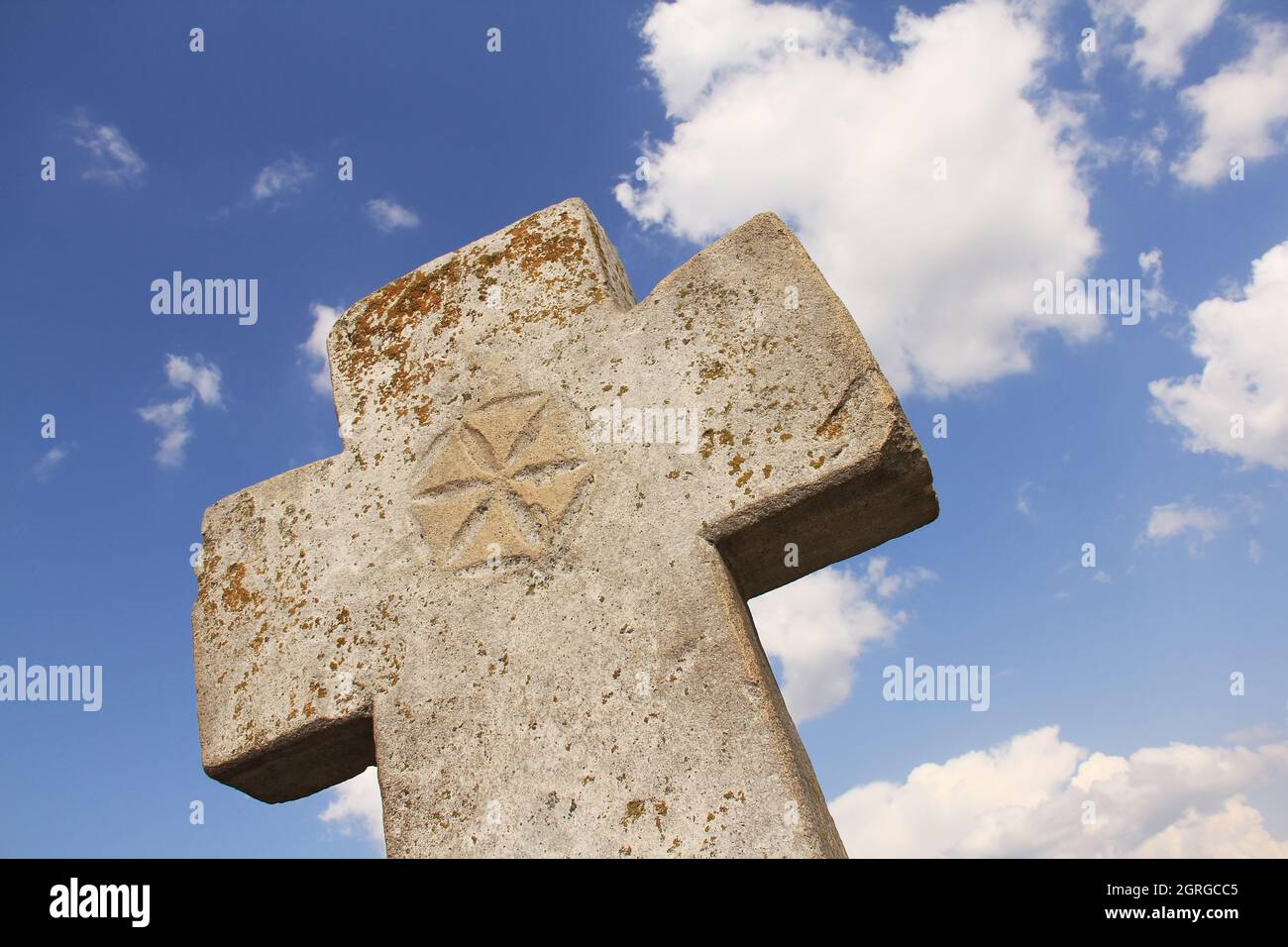 Cross in the blue sky Stock Photo - Alamy