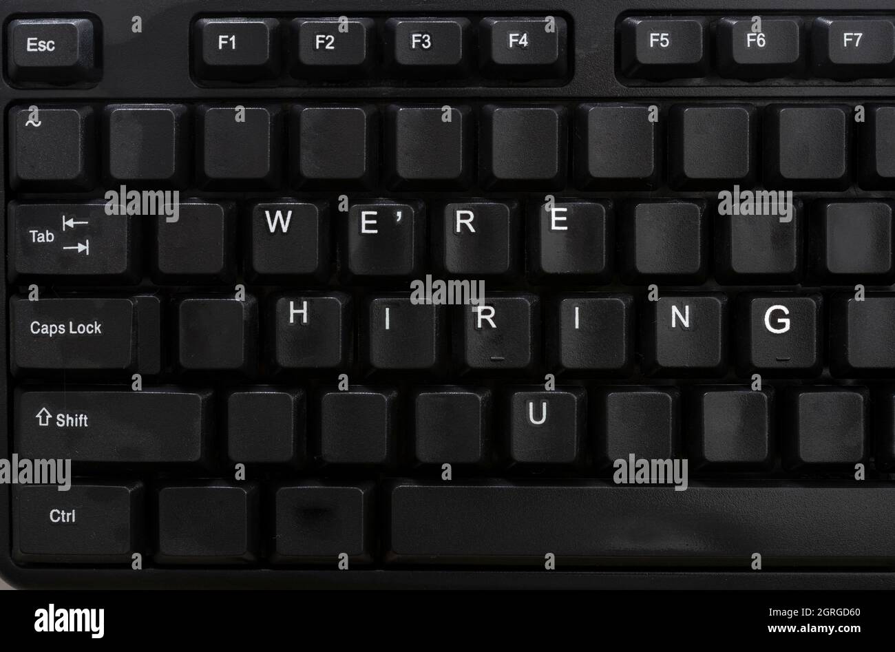 we're hiring you written with keyboard letters rearranged Stock Photo ...