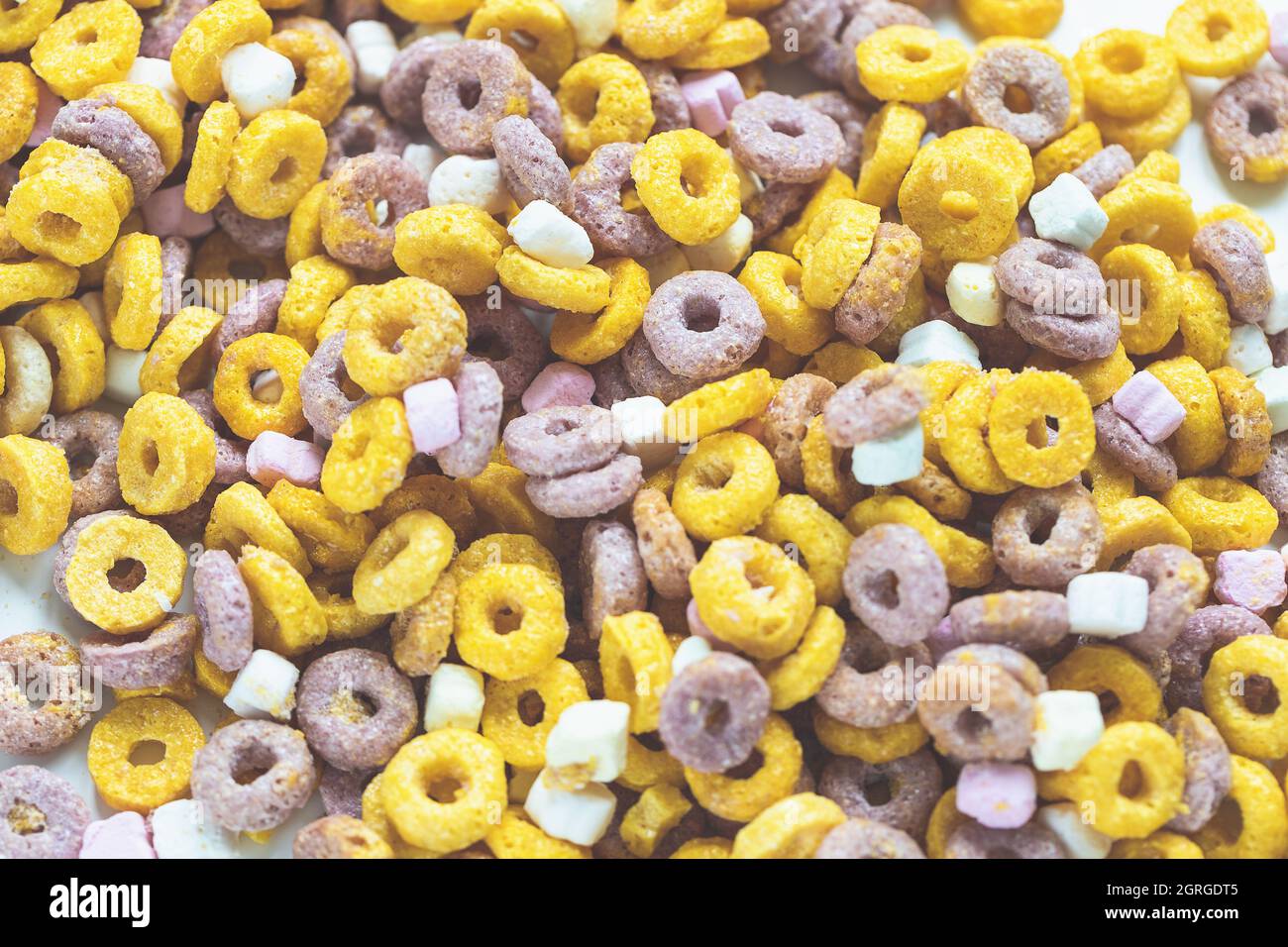 Multi colored cereal fruit loops background. Close up. Breakfast ...