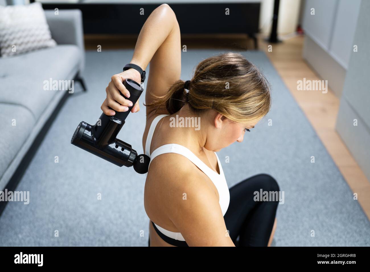 Massage Gun Machine Recovery Therapy And Stimulation Stock Photo - Alamy