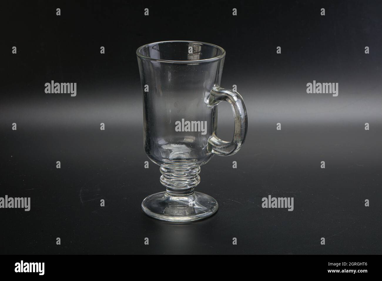 Empty glass cup for drinks isolated Stock Photo - Alamy