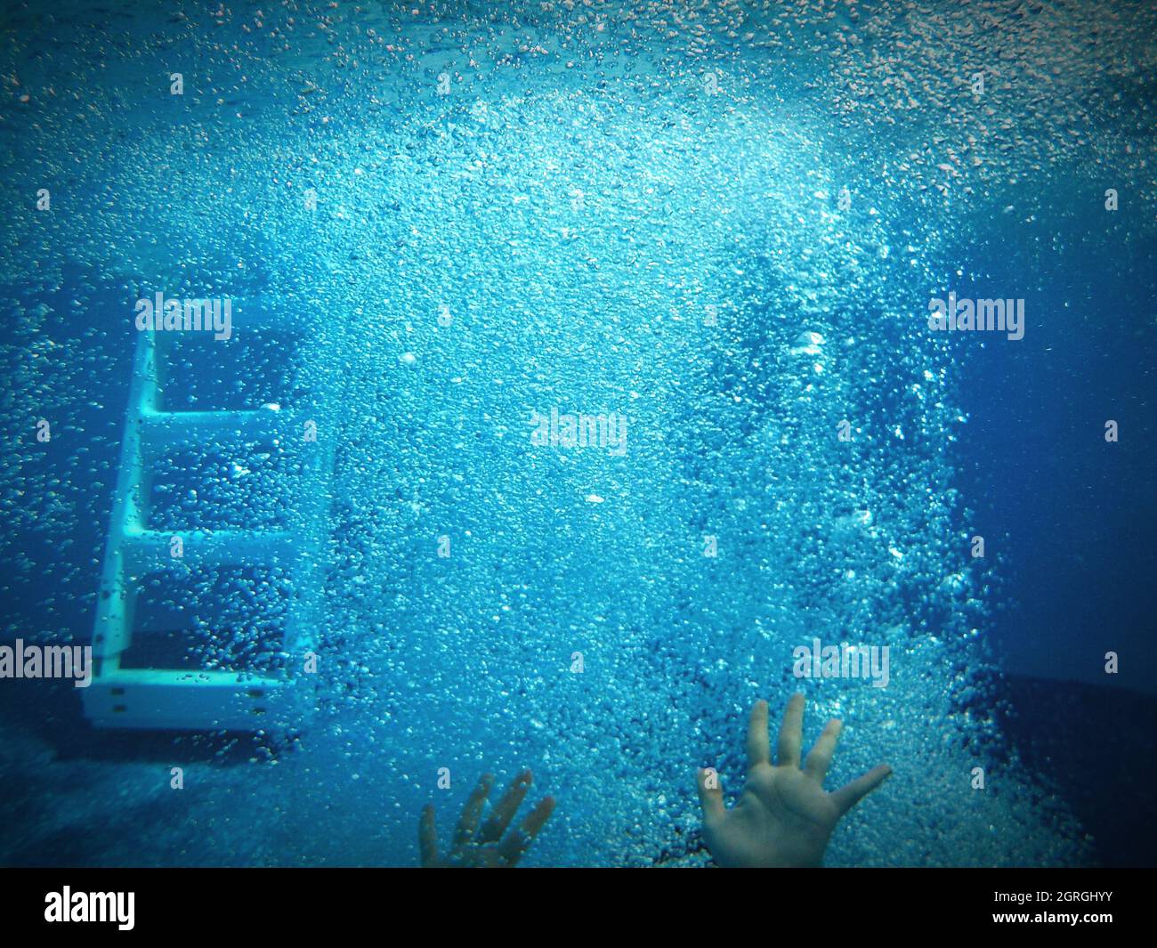 Hand reaching underwater hi-res stock photography and images - Alamy