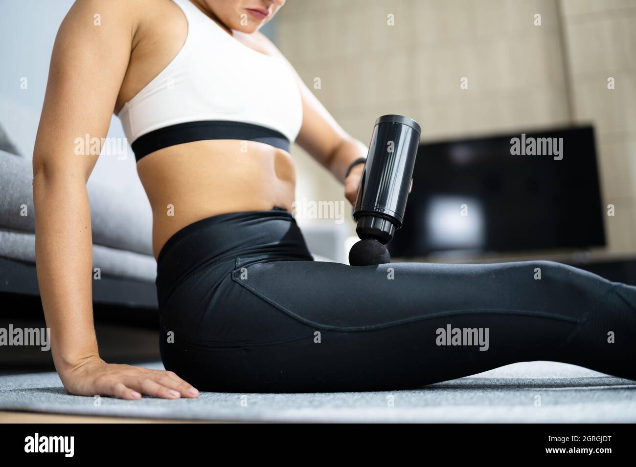 Massage Gun Machine Recovery Therapy And Stimulation Stock Photo - Alamy