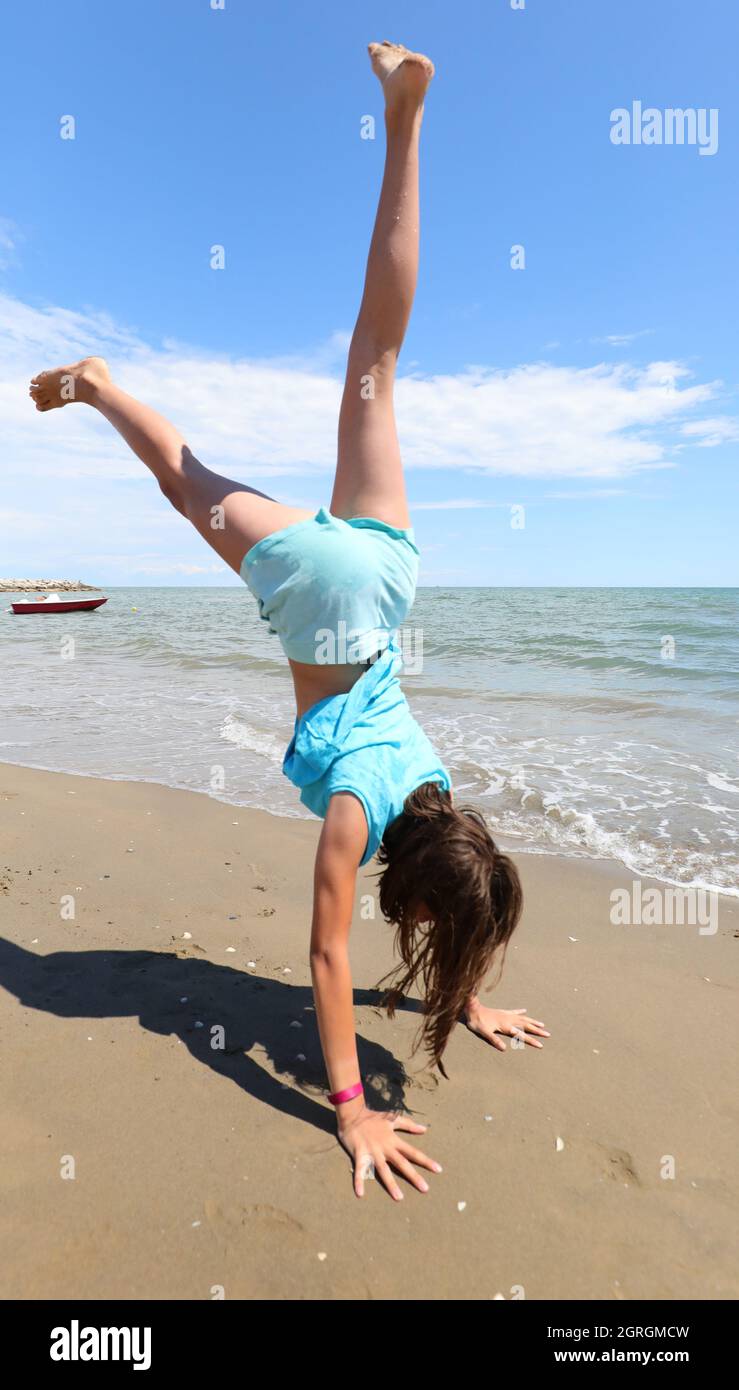 Children gymnastics somersault hi-res stock photography and images - Alamy
