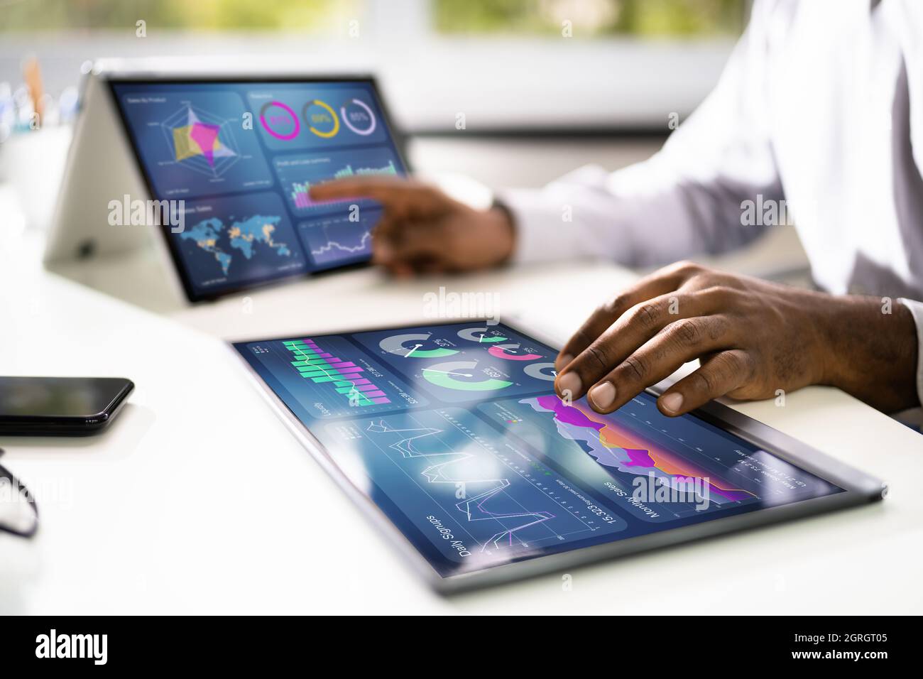 African Businessman Using Analytics Data KPI Dashboard Tech Stock Photo ...