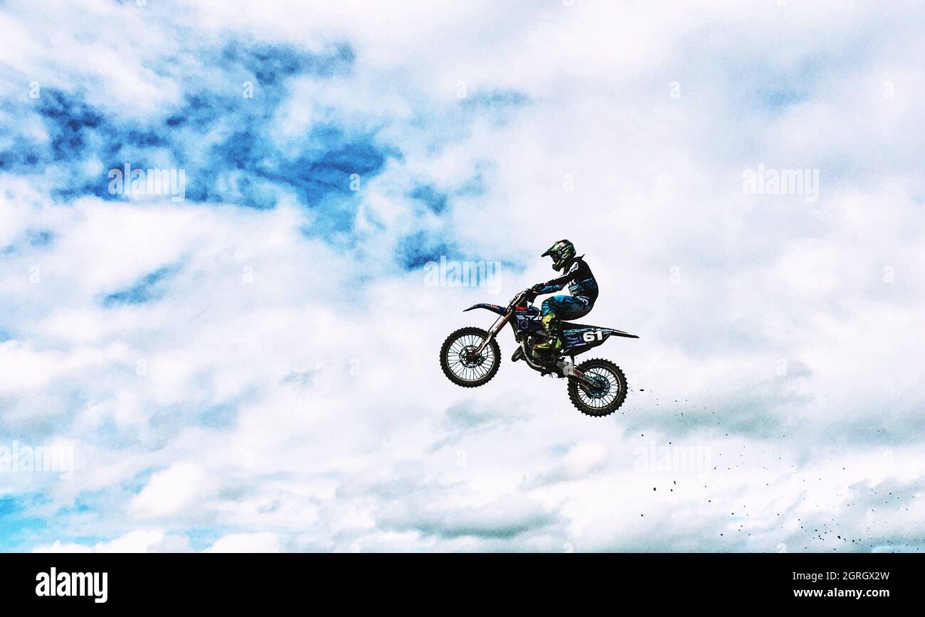 Biker riding motorcycle low angle hi-res stock photography and images ...