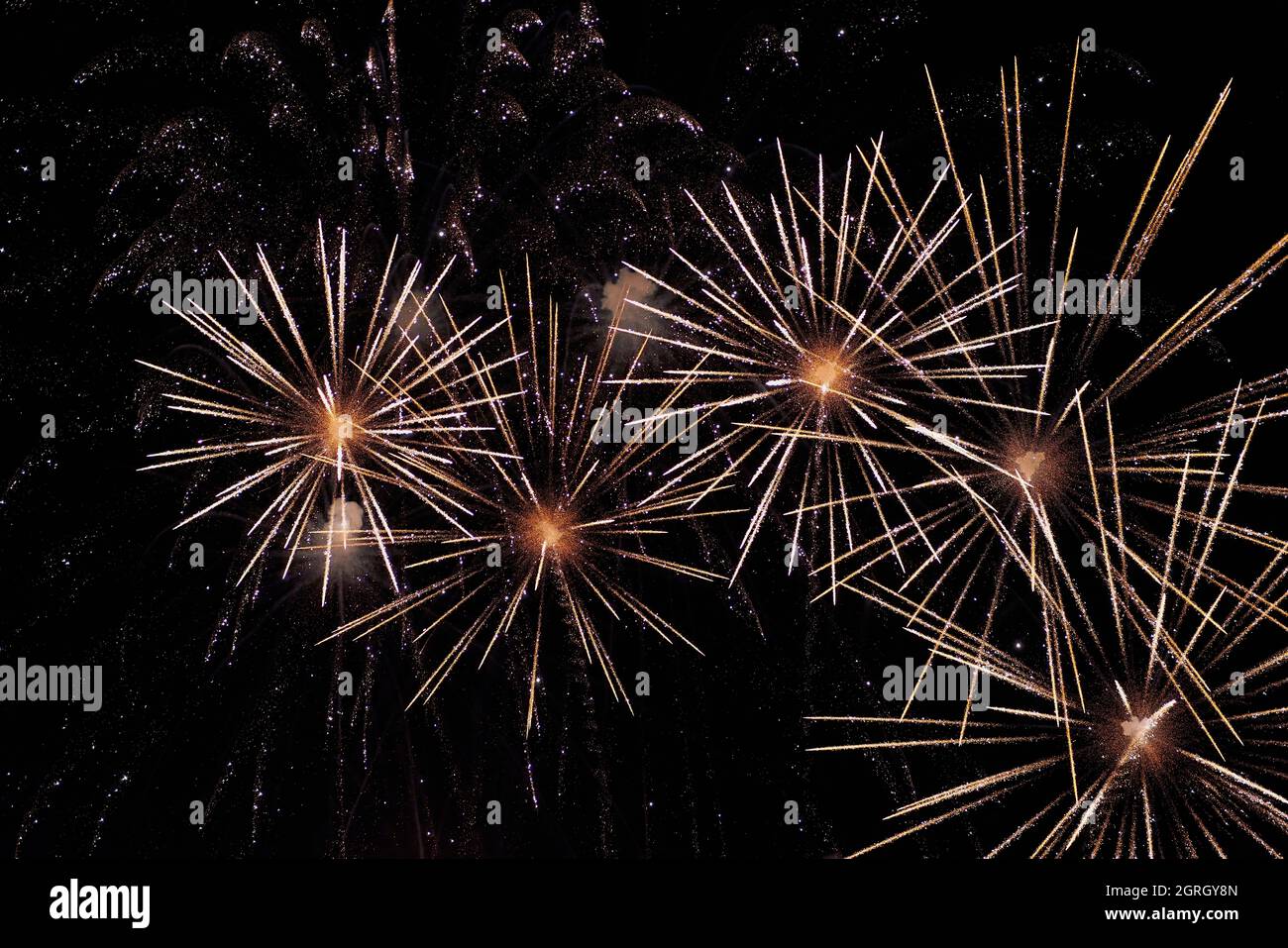 Low angle view of fireworks exploding against sky at night, Toledo ...