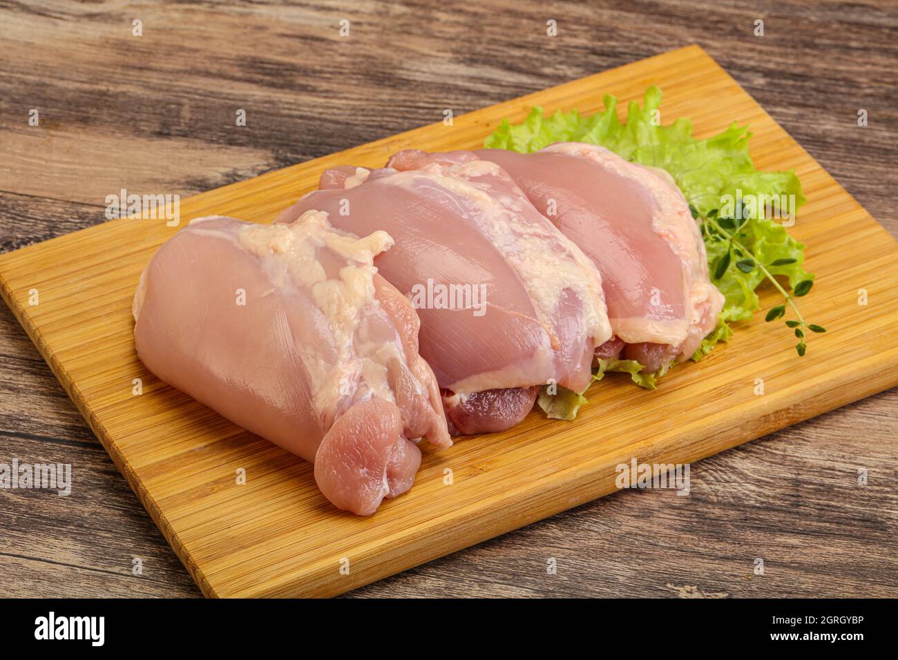 Raw chicken boneless and skinless leg for cooking Stock Photo - Alamy