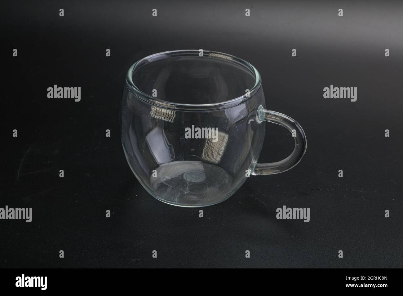 Empty glass cup for drinks isolated Stock Photo - Alamy