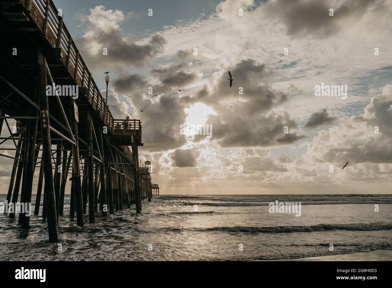 the pier right before sunset Stock Photo - Alamy