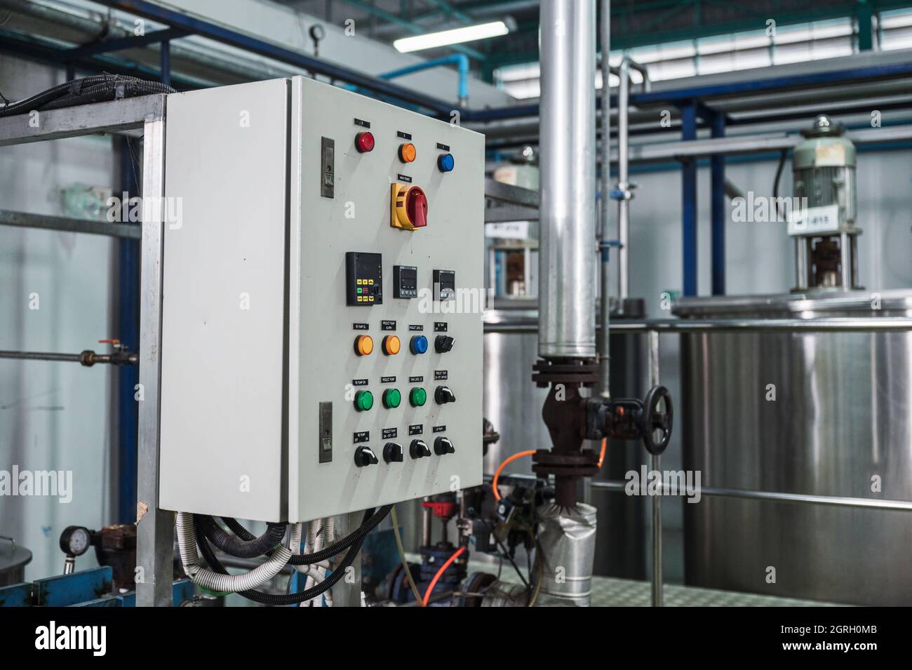 Control panel of stainless pipeline and tanks system in labolary at beverage processing plant ...