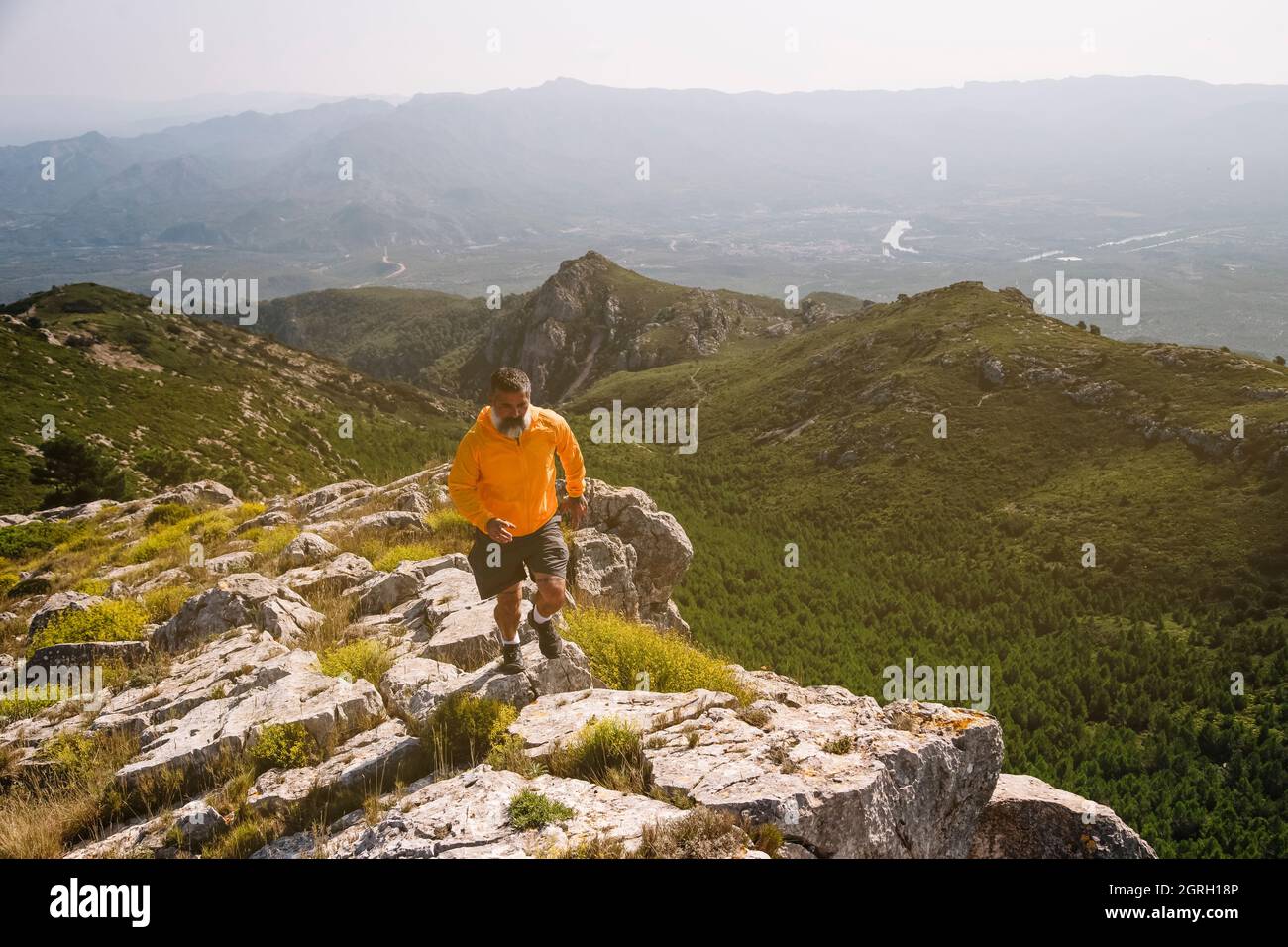 Male runner running on country hi-res stock photography and images - Alamy