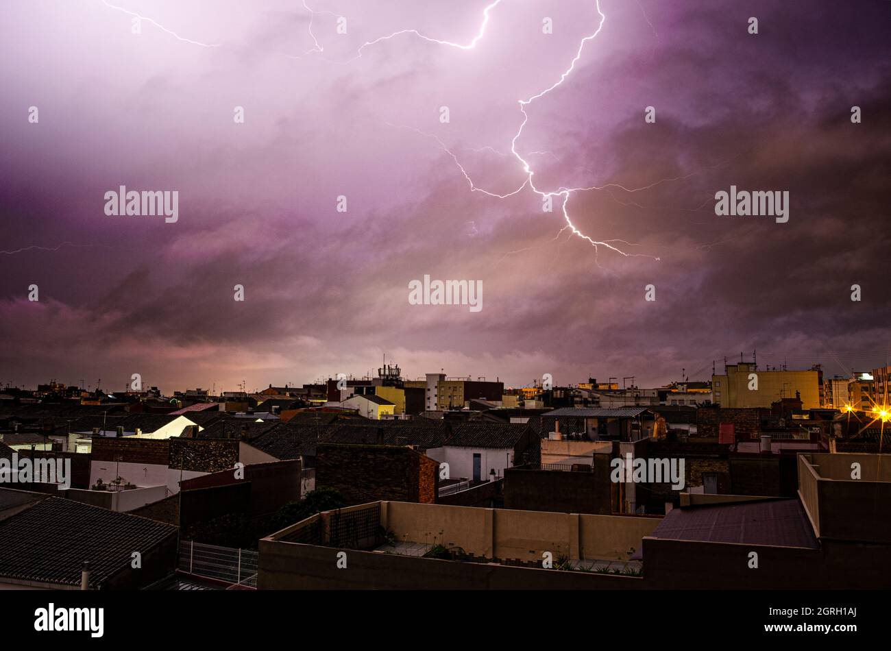 Electrical storm in night landscape Stock Photo - Alamy