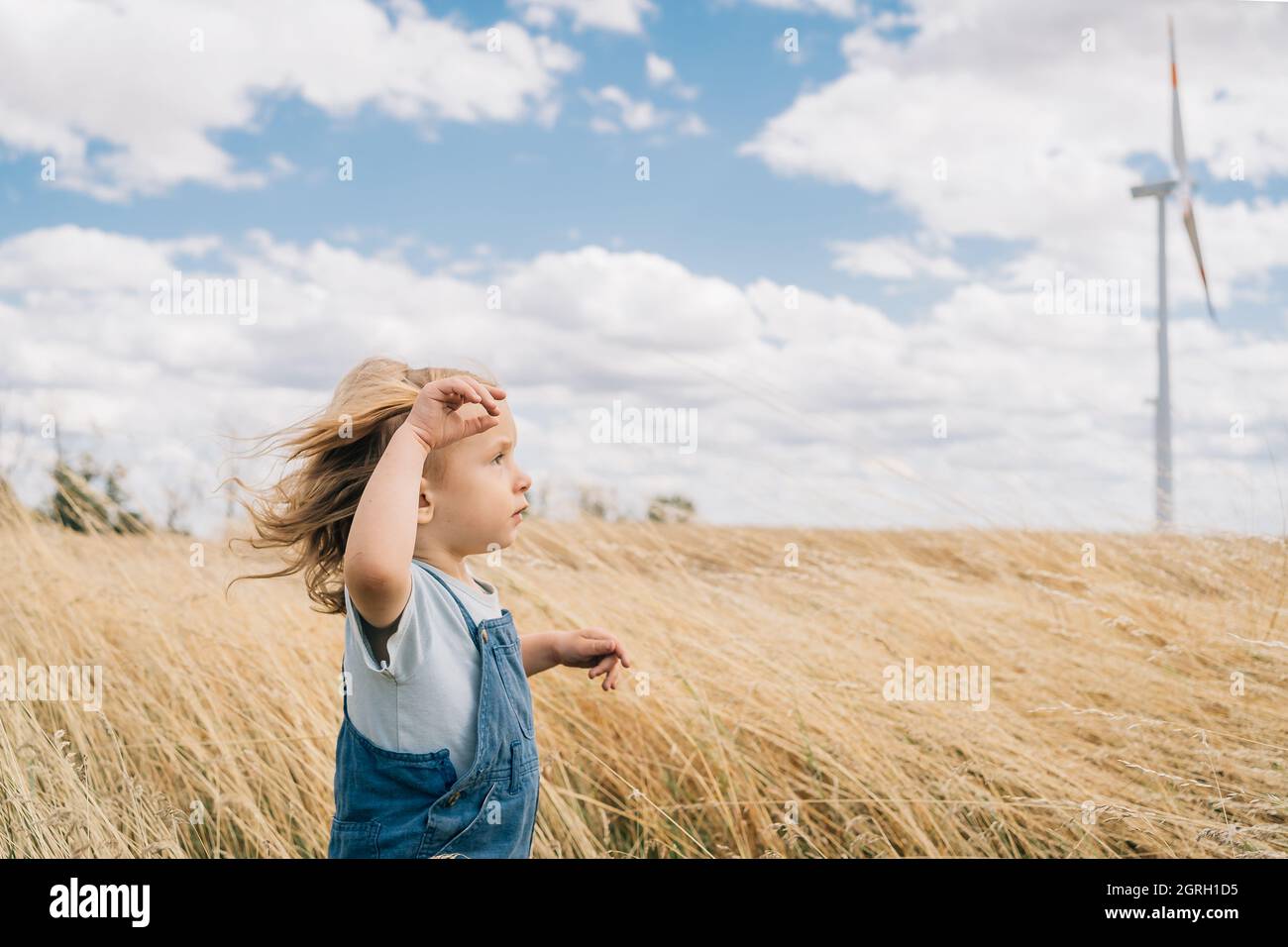 Child wind farm hi-res stock photography and images - Alamy