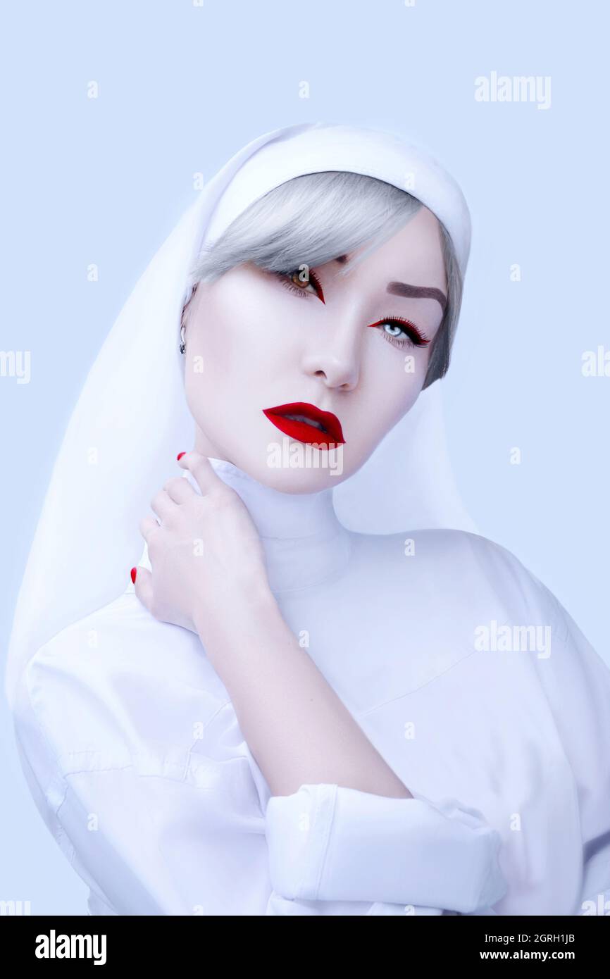Gothic Nurse in white uniform Stock Photo - Alamy