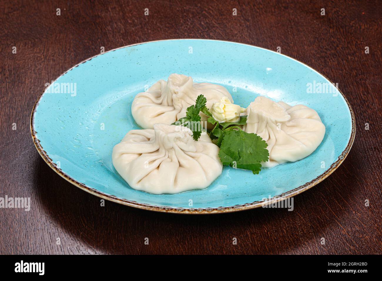 Georgian traditional cuisine - khinkali dumplings with meat Stock Photo ...