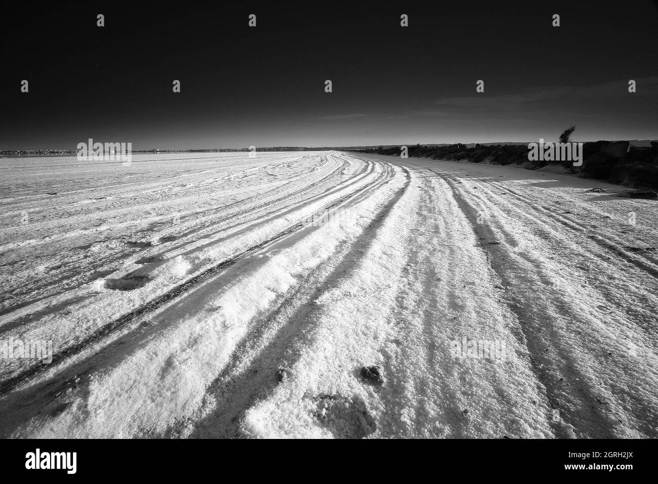 Grayscale of a snowy field Stock Photo - Alamy