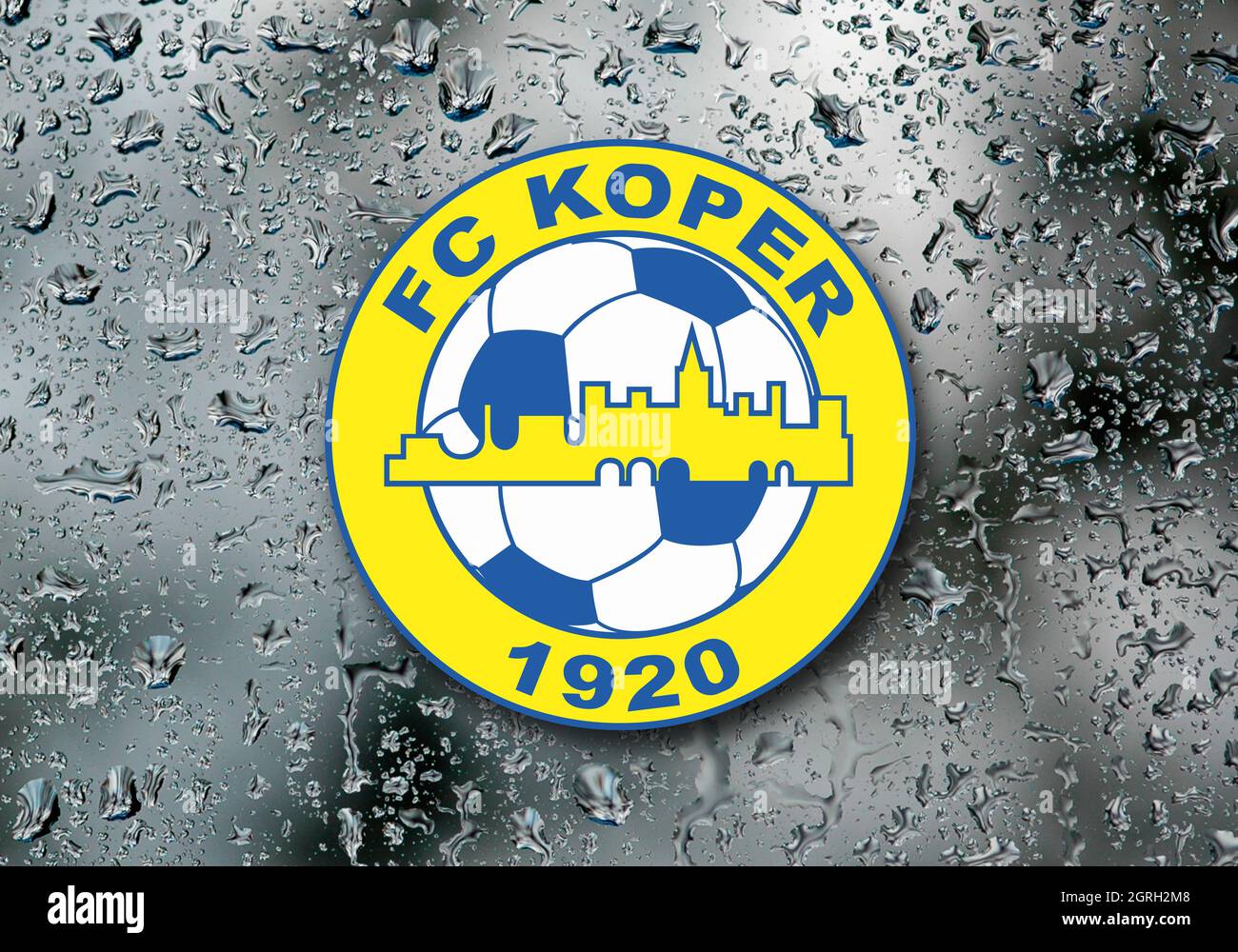 Coat of arms FC Koper, football club from Slovenia, wet glass ...