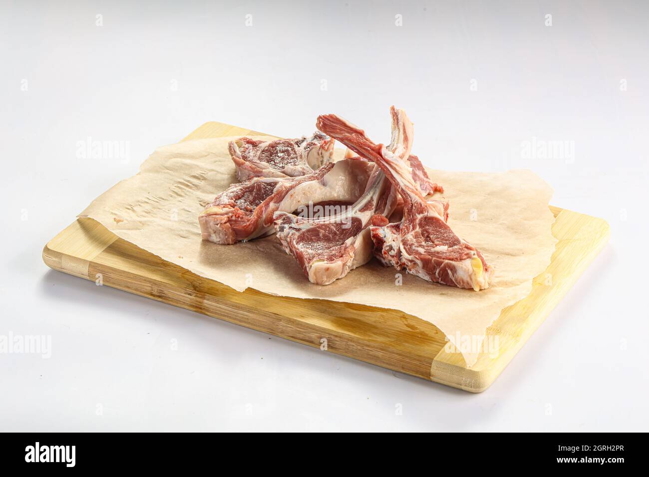 Raw lamb loin rack chop isolated Stock Photo - Alamy