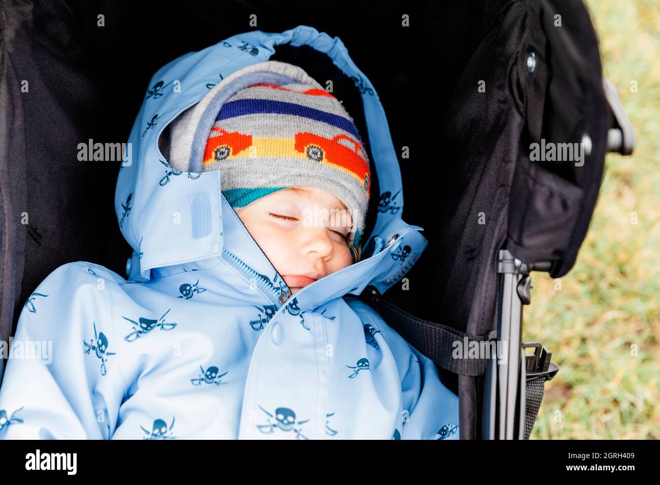 Baby sleeping on stroller in hi-res stock photography and images - Alamy