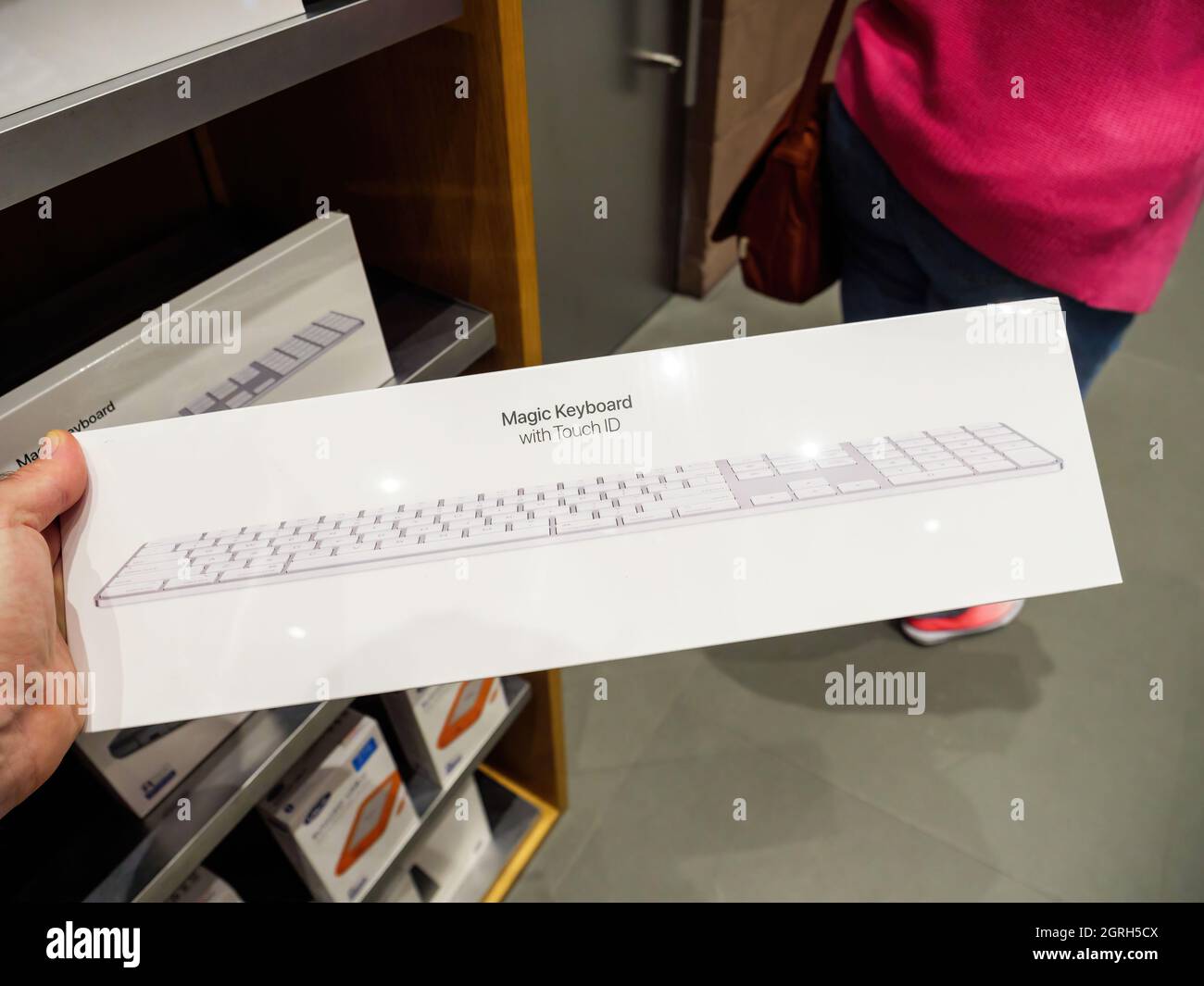 Male hand holding inside apple store latest Apple Computers Magic ...