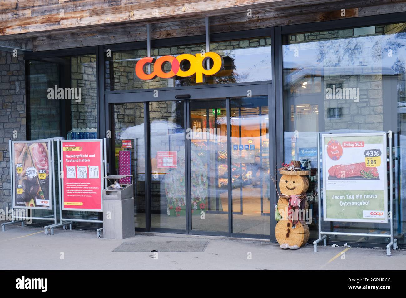 Coop grocery store entrance in mountain town Arosa. Coop is one of ... Coop grocery store entrance in mountain town Arosa. Coop is one of ...