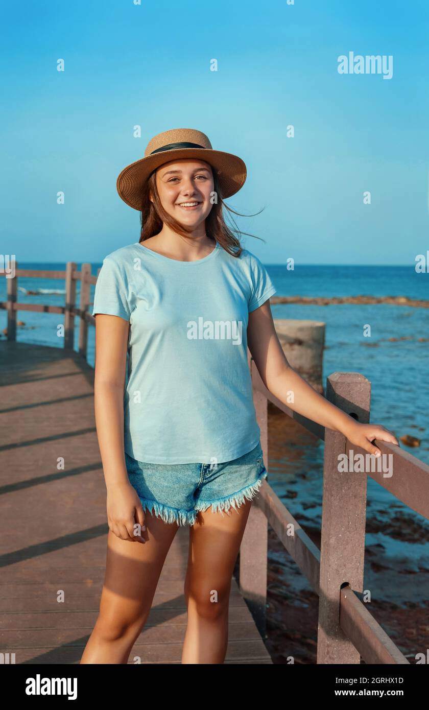 Wearing light blue hi-res stock photography and images - Alamy