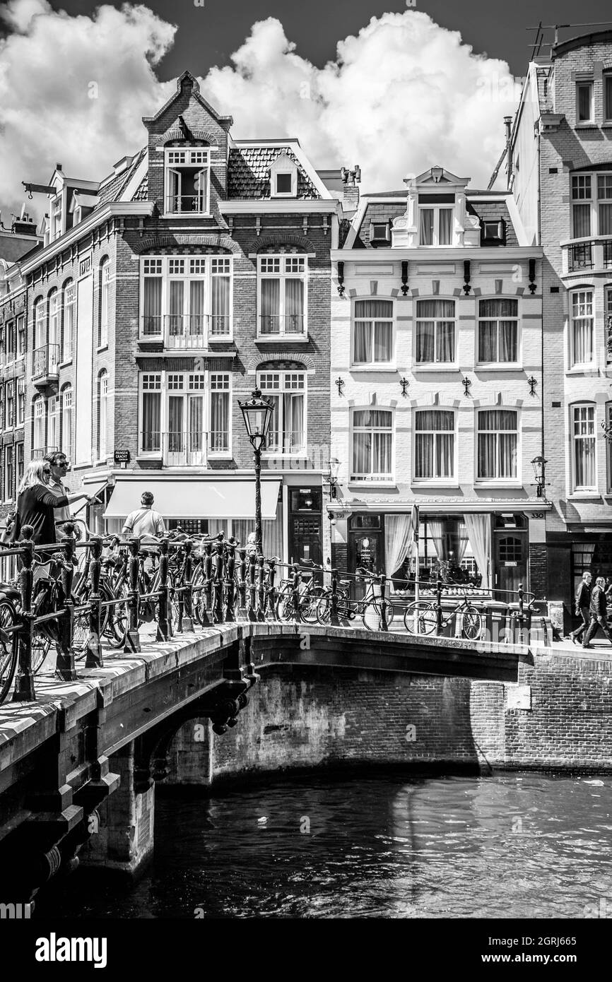The scenic canals and architecture of Holland's capital city Amsterdam ...