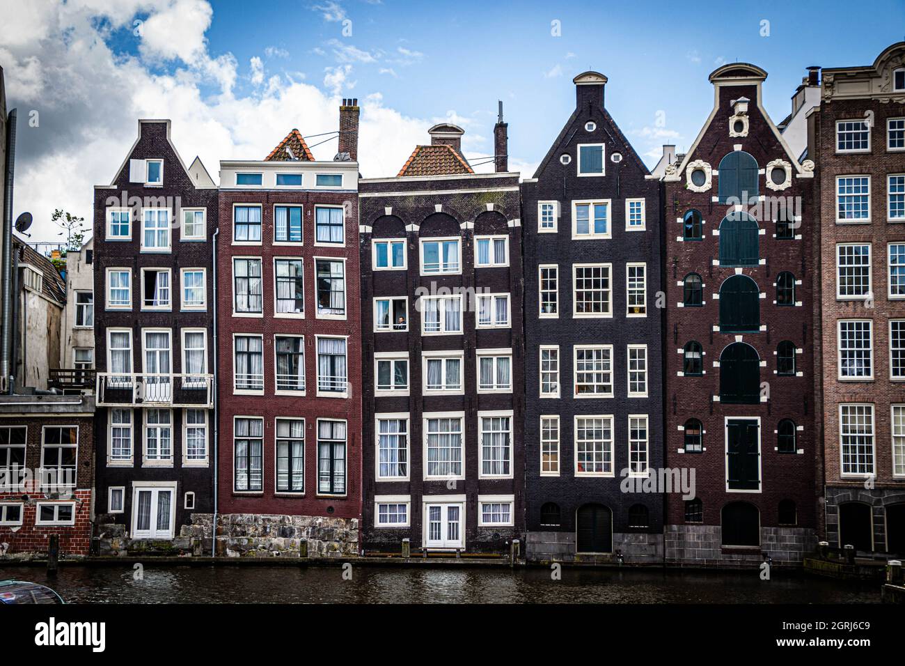 The scenic canals and architecture of Holland's capital city Amsterdam ...