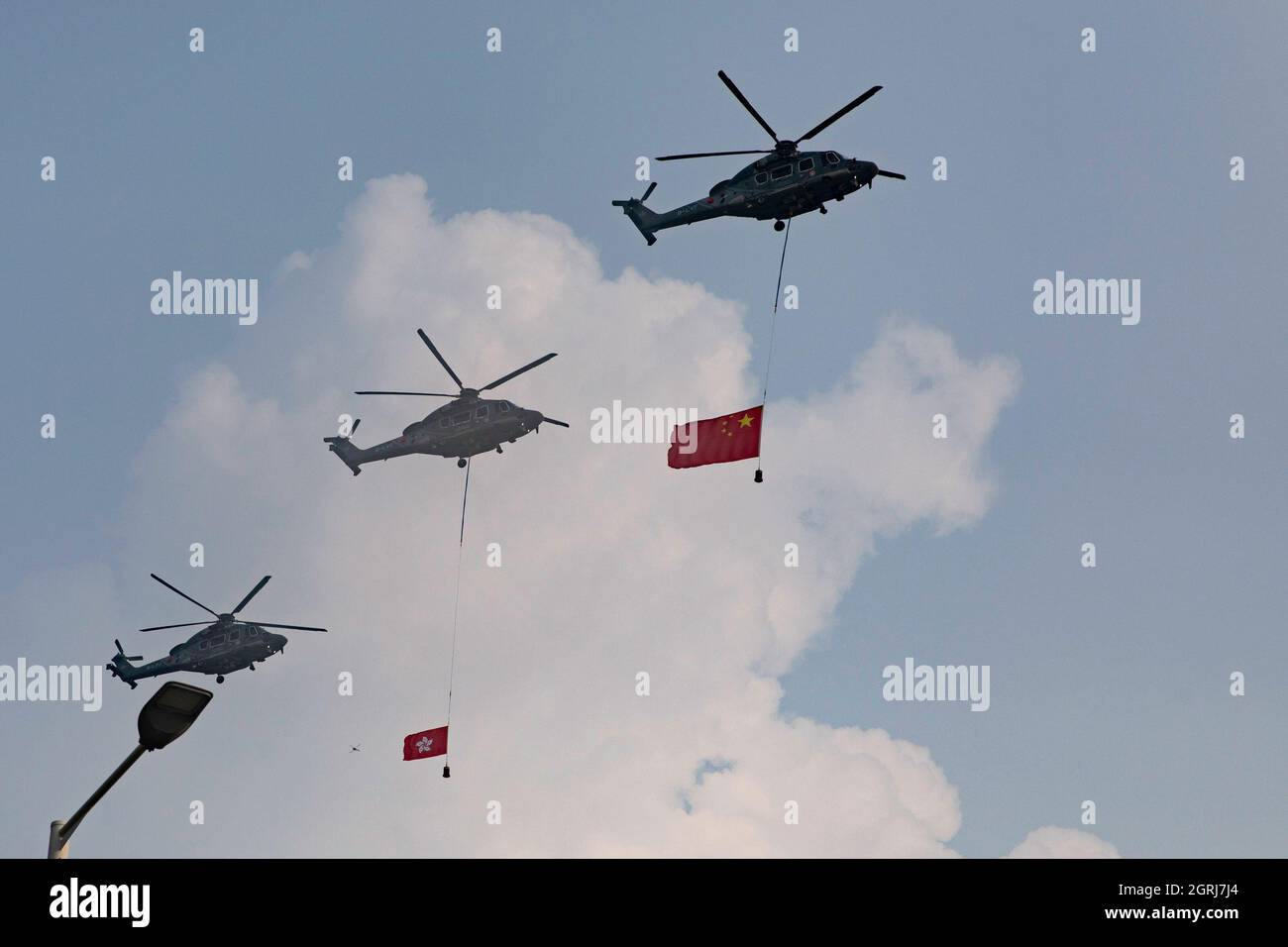Helicopters carrying flag hi-res stock photography and images - Alamy