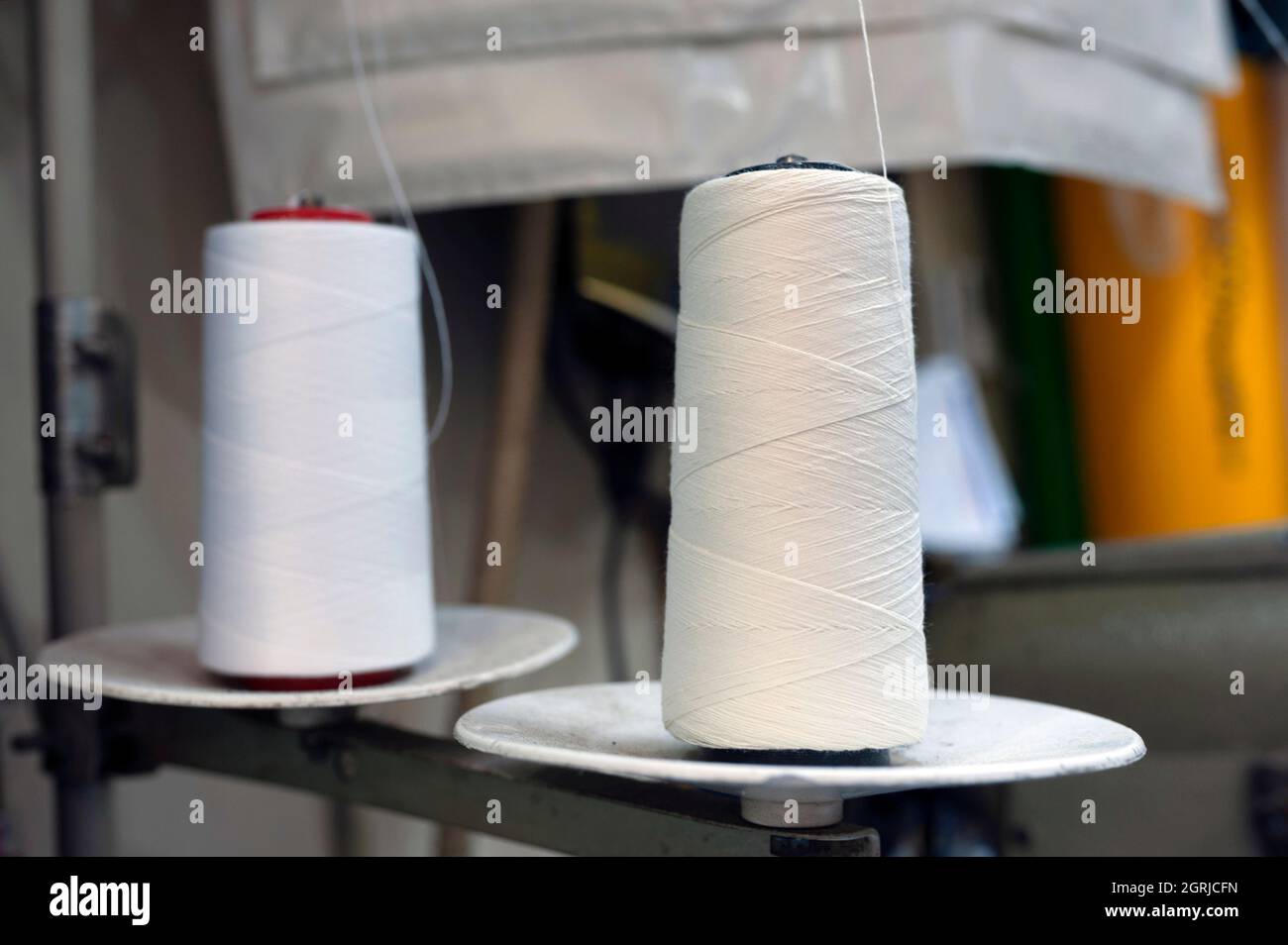 White threads hi-res stock photography and images - Alamy