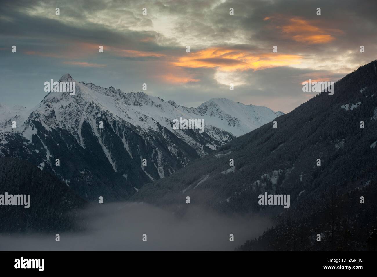 Sunset view of the snow-covered Alps in Austria Stock Photo - Alamy