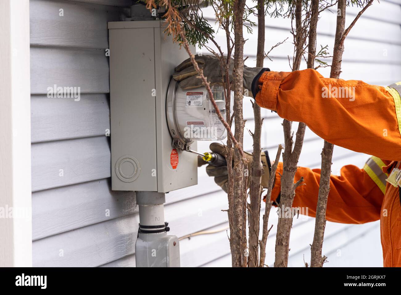 Picture of hands of a skillful worker, wearing shock proof gloves and ...
