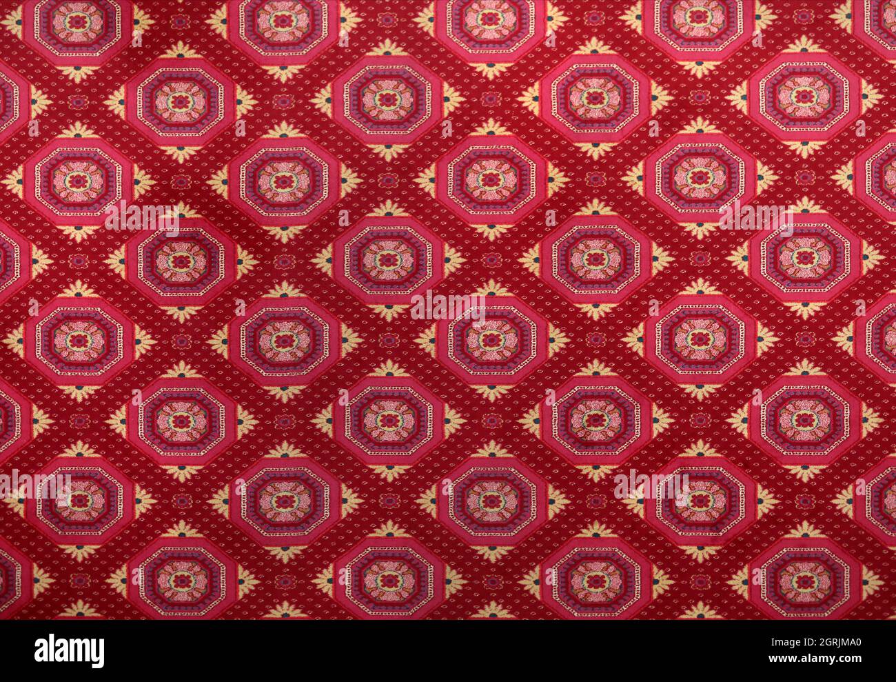 Large red carpet with checkered patterns Stock Photo - Alamy