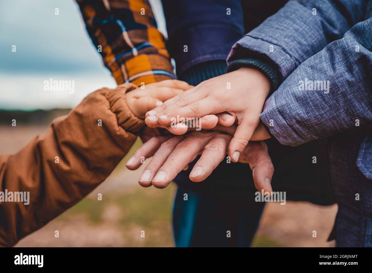 Closeup of the people's hands together Stock Photo - Alamy