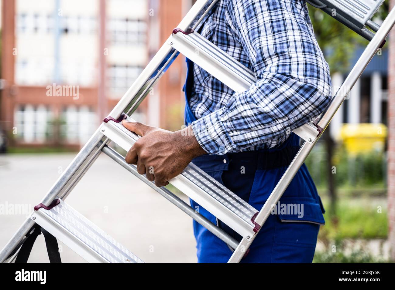 Step Ladder Safety. Handyman Or Repair Man Stock Photo - Alamy