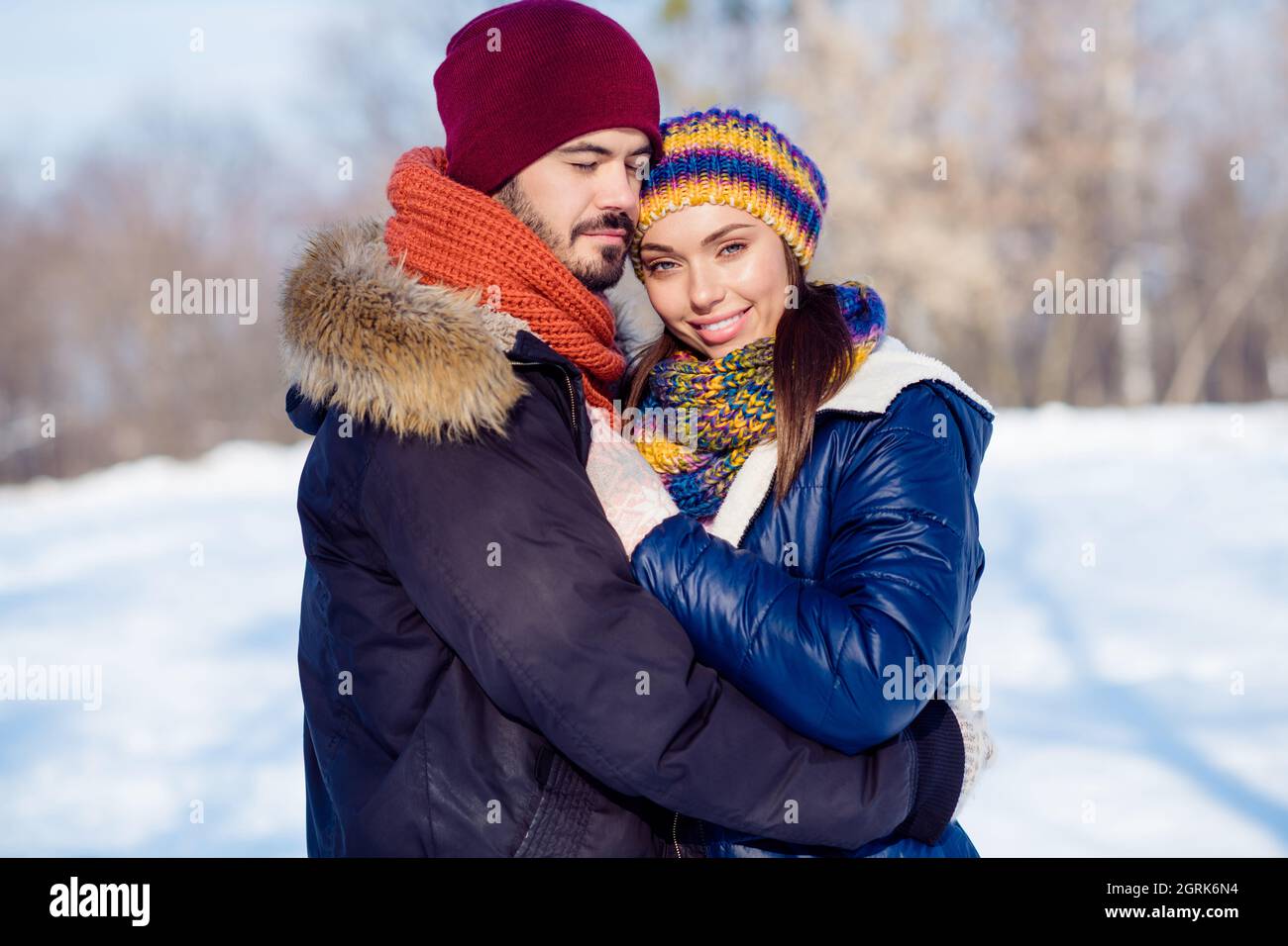 Profile side photo of young attractive couple happy positive smile hug ...