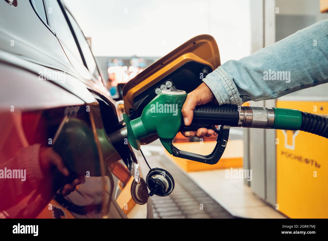 Car refueling fuel on petrol station. Automotive industry or ...