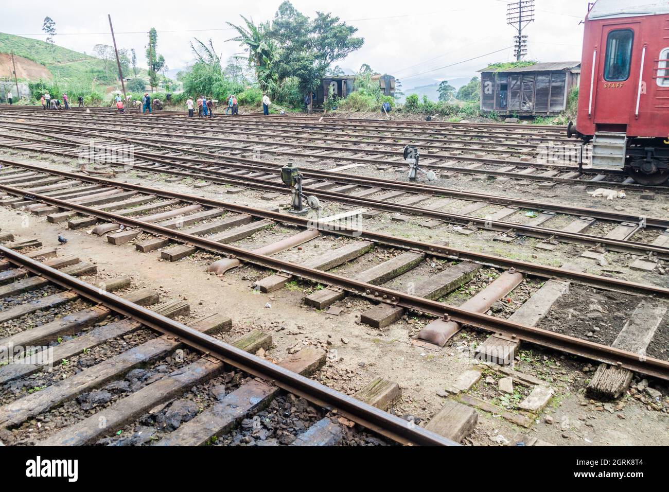 NANU OYA, SRI LANKA - JULY 17, 2016: Workers at a train station in Nanu ...
