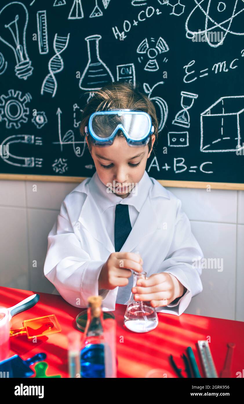 Boy wearing uniform in classroom hi-res stock photography and images ...
