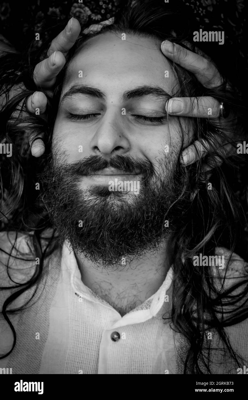 Woman touching boyfriend face with hand Black and White Stock Photos ...